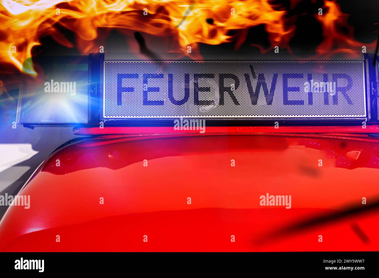 4 April 2024: Fire brigade vehicle with blue light and the lettering ...