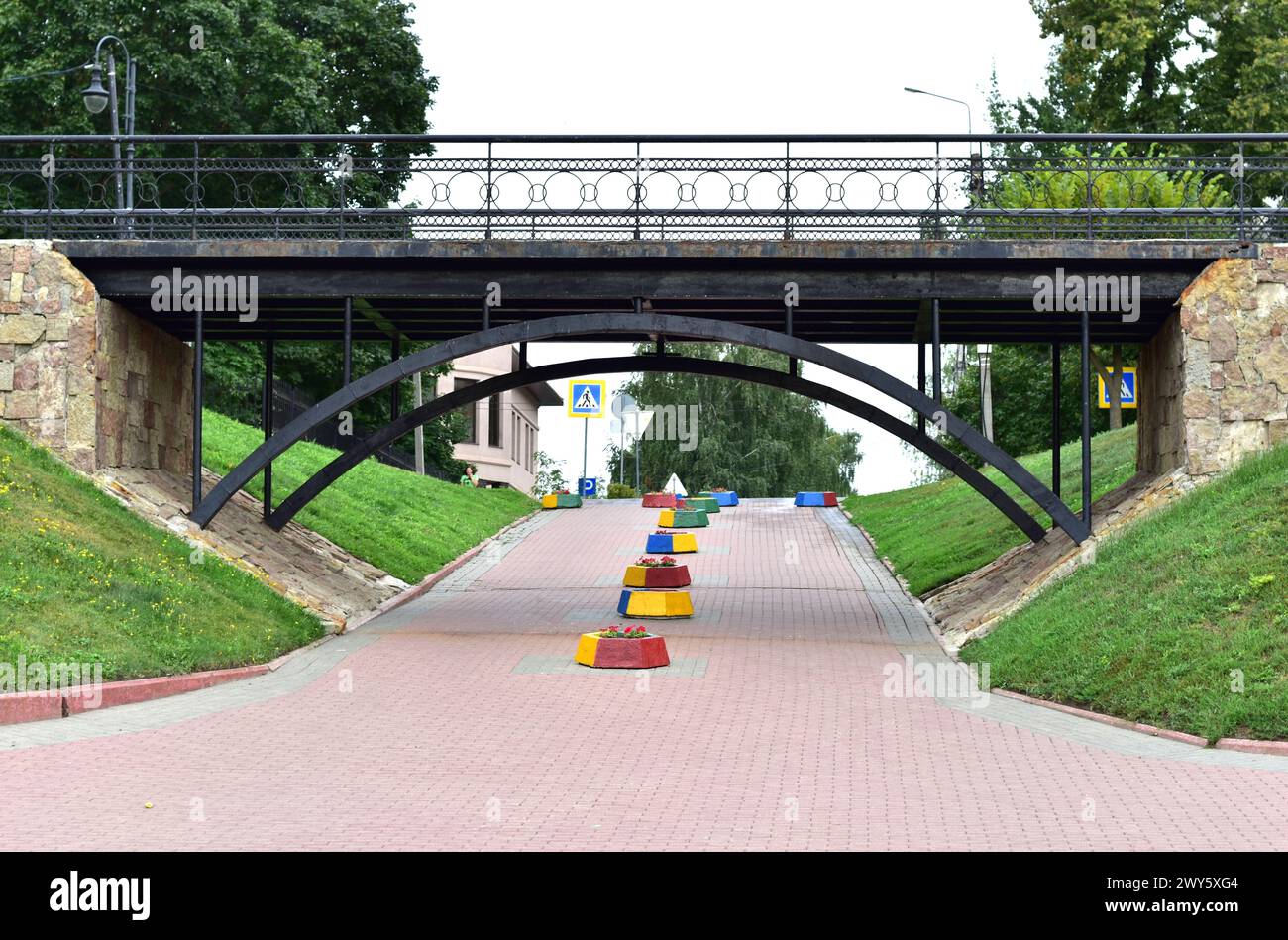 Small footbridge built of wrought iron and a park path Stock Photo - Alamy