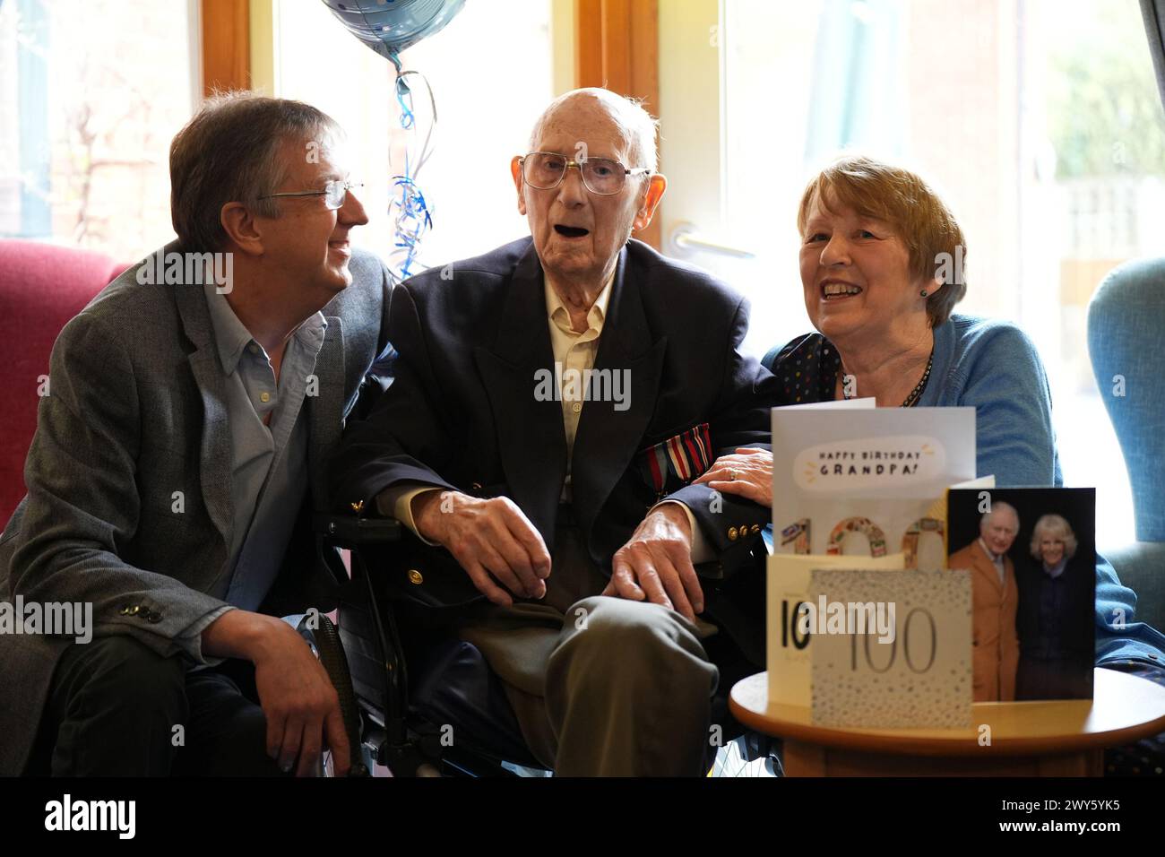 Ian Brignall and Sue Whelan, sit with their father Ronald Brignall who ...