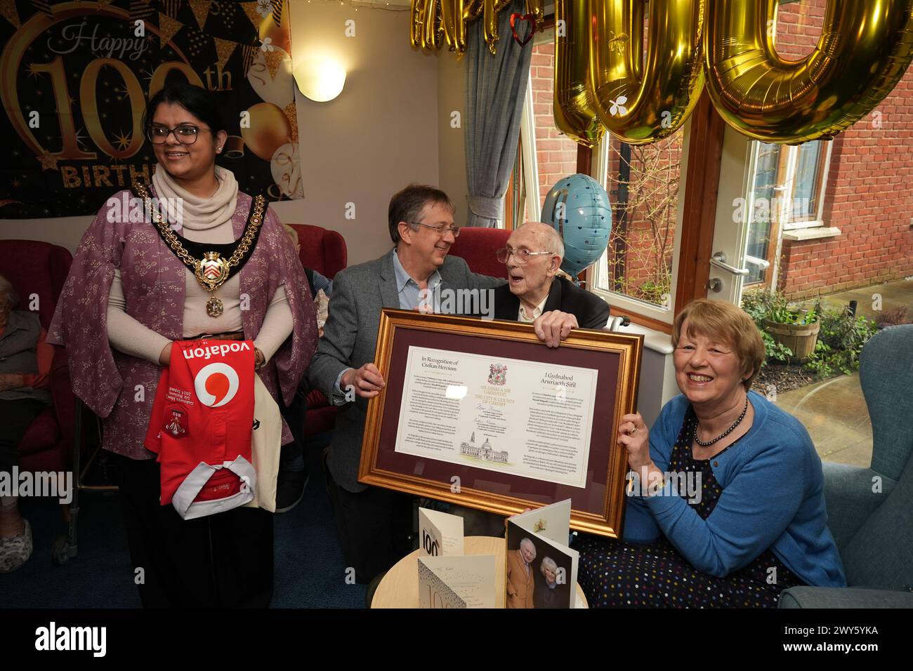 The Lord Mayor of Cardiff, Councillor Bablin Molik, (left), presents ...