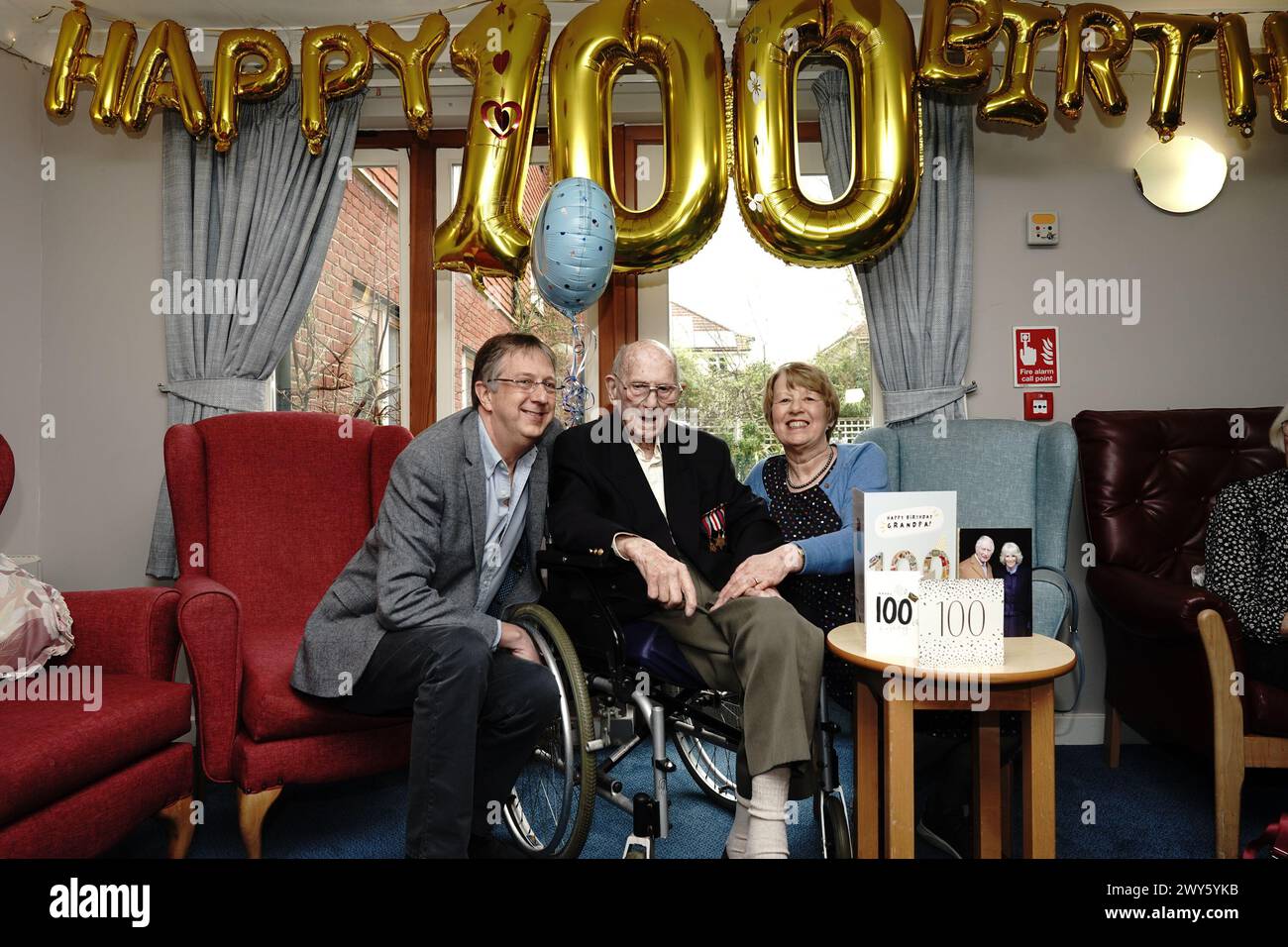 Ian Brignall and Sue Whelan, sit with their father Ronald Brignall who ...