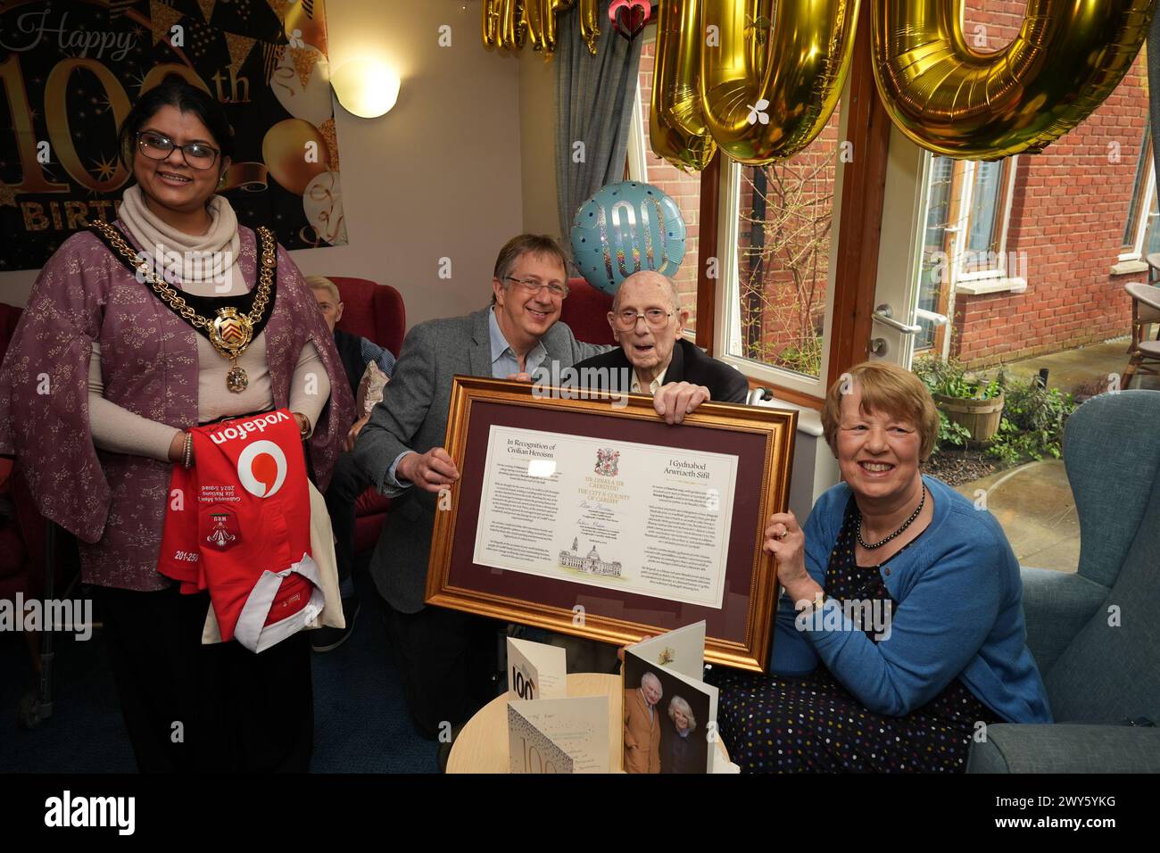 The Lord Mayor of Cardiff, Councillor Bablin Molik, (left), presents ...