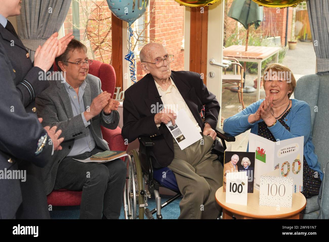 Ian Brignall and Sue Whelan, sit with their father Ronald Brignall who ...