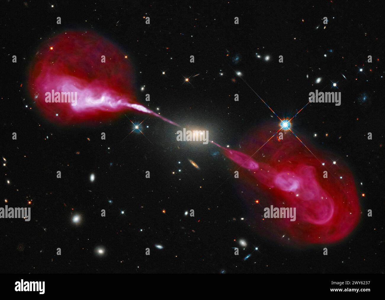 Radio Galaxy Hercules A. Digital enhancement of an image by NASA Stock ...