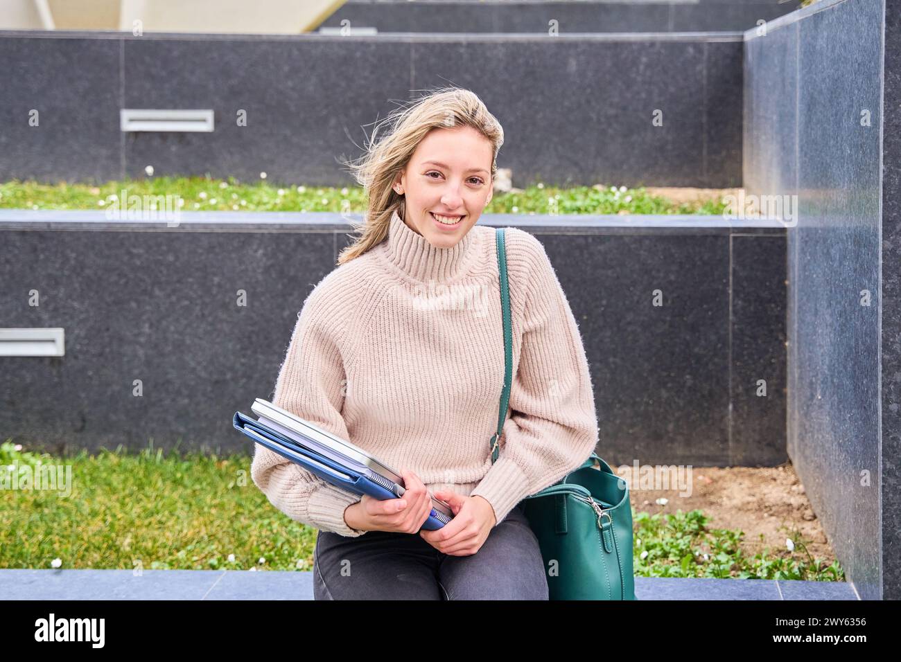 College student sitting on hi-res stock photography and images - Alamy