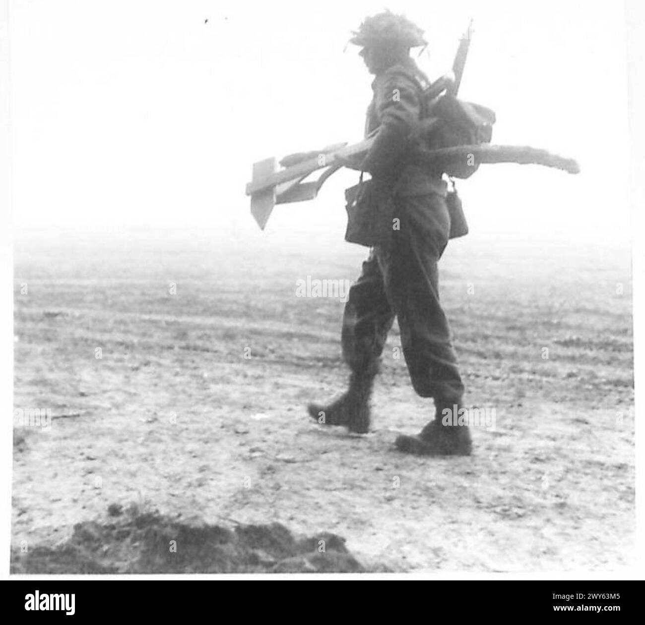 BRITISH ATTACK IN FRANCE - A light AA gunner goes forward with notice ...