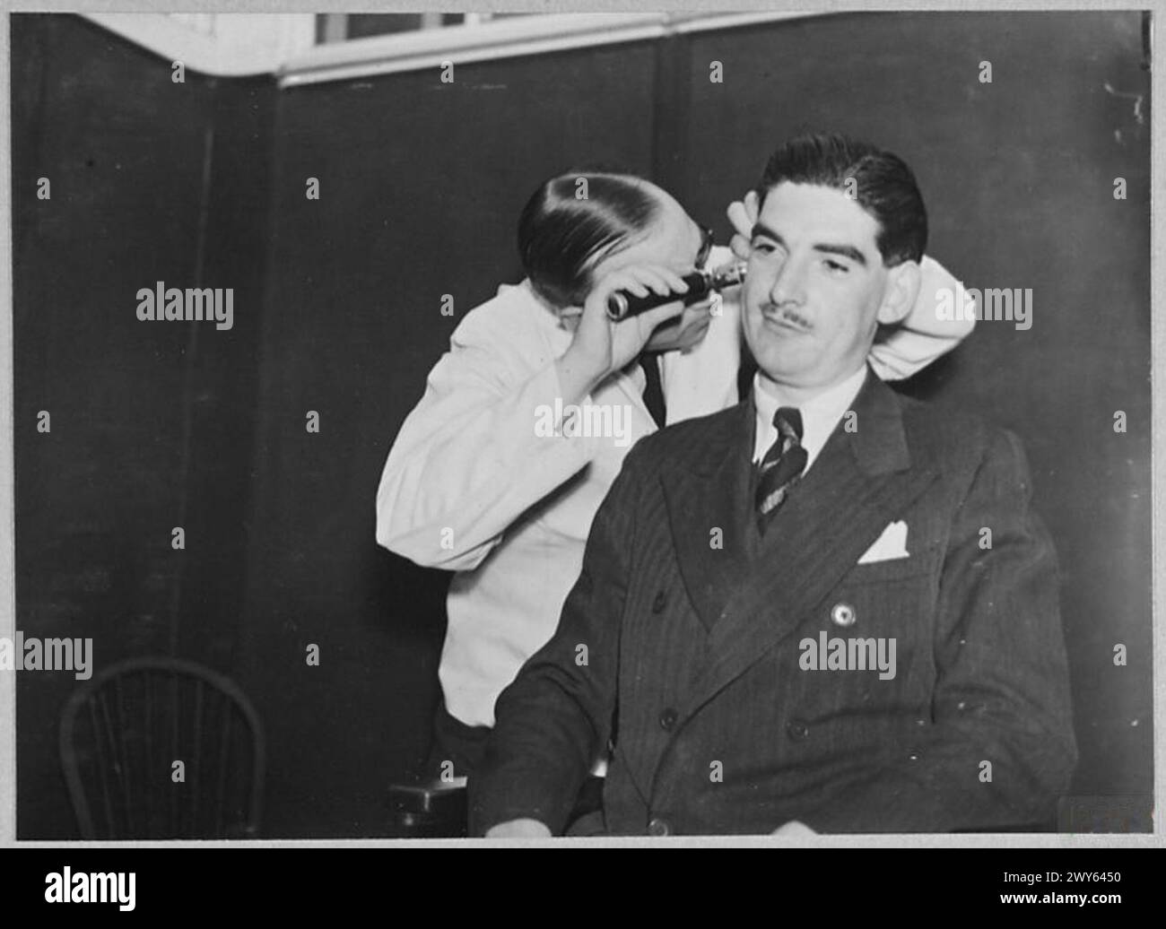 Prospective British pilots must pass a thorough ear examination to ...