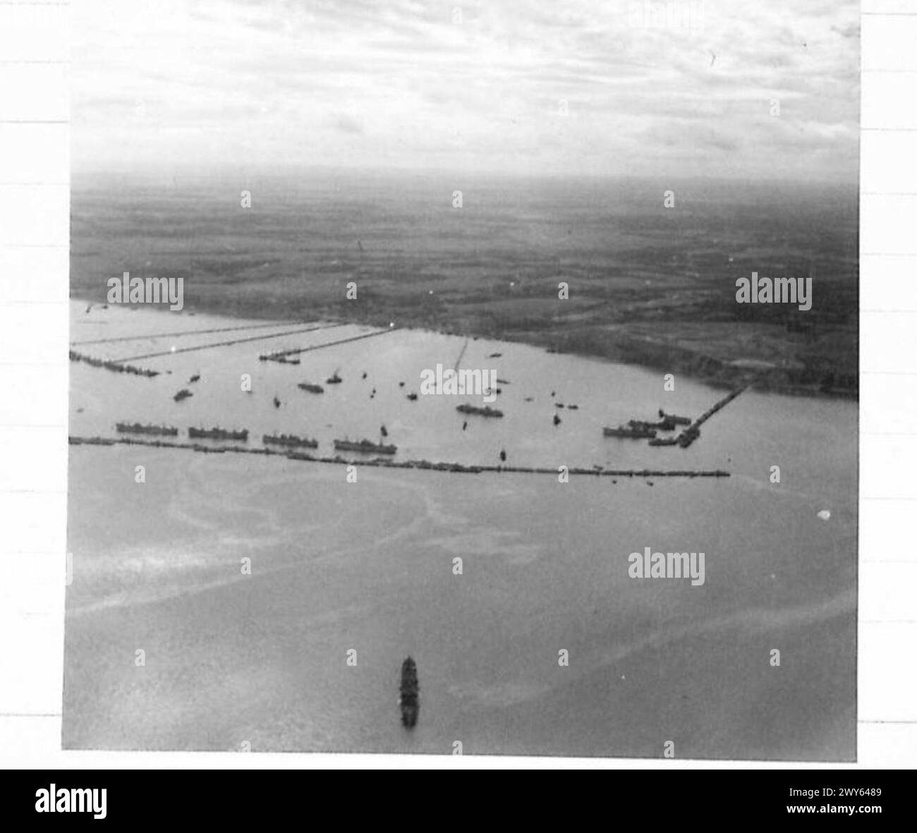 Aerial photographs show Mulberry B at Arromanches used by the British ...