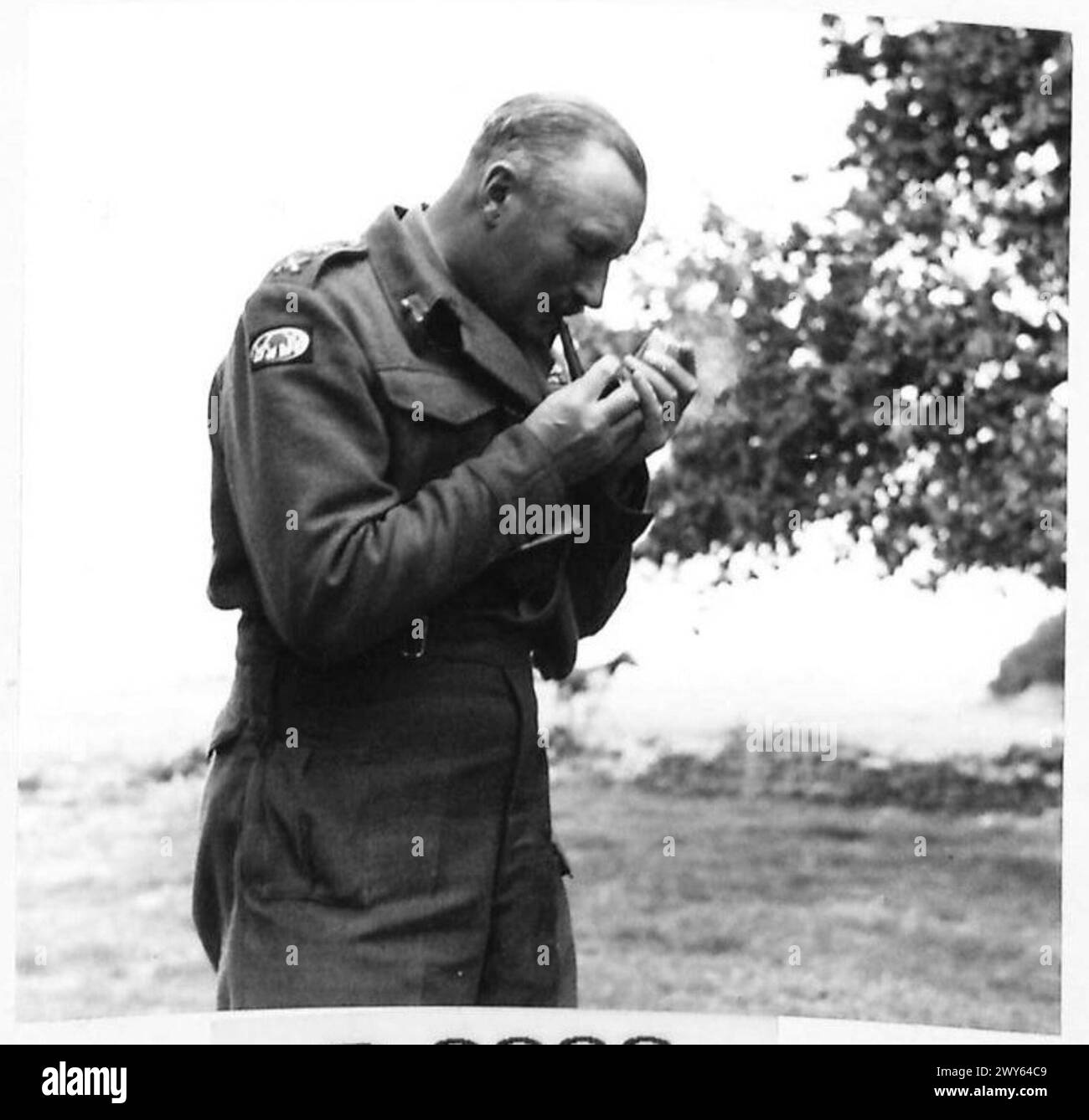 LIEUT. GENERAL N. M. RITCHIE - Lt.Gen.Ritchie lighting his favourite ...