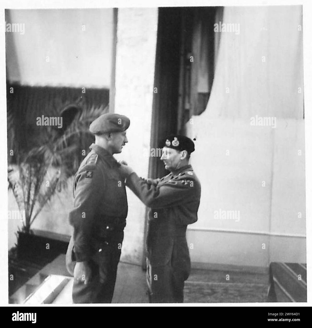 43 DIV. INVESTITURE - Lt-Col G. Taylor, 5th DCLI, receives the DOS ...