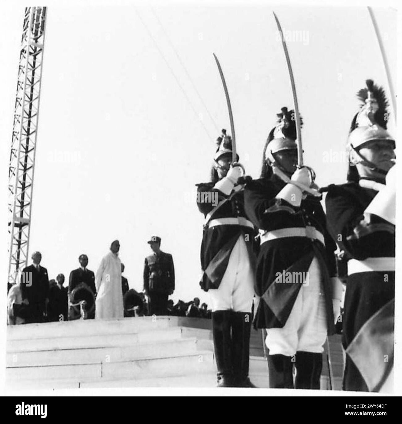 General de Gaulle and the Sultan of Morocco take the salute during a ...