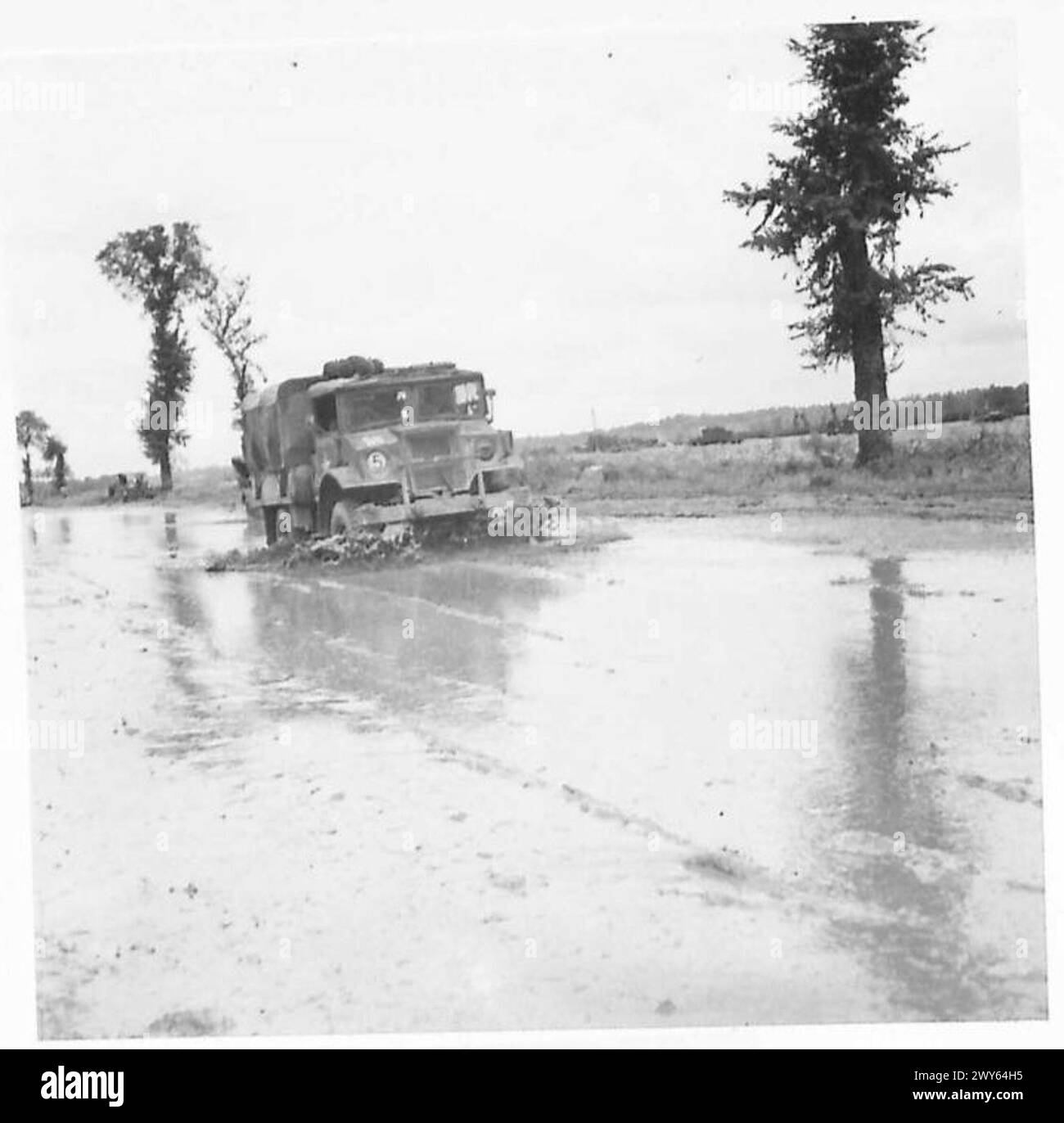 FLOODS IN NORMANDY - Vehicles making their way through the flooded ...