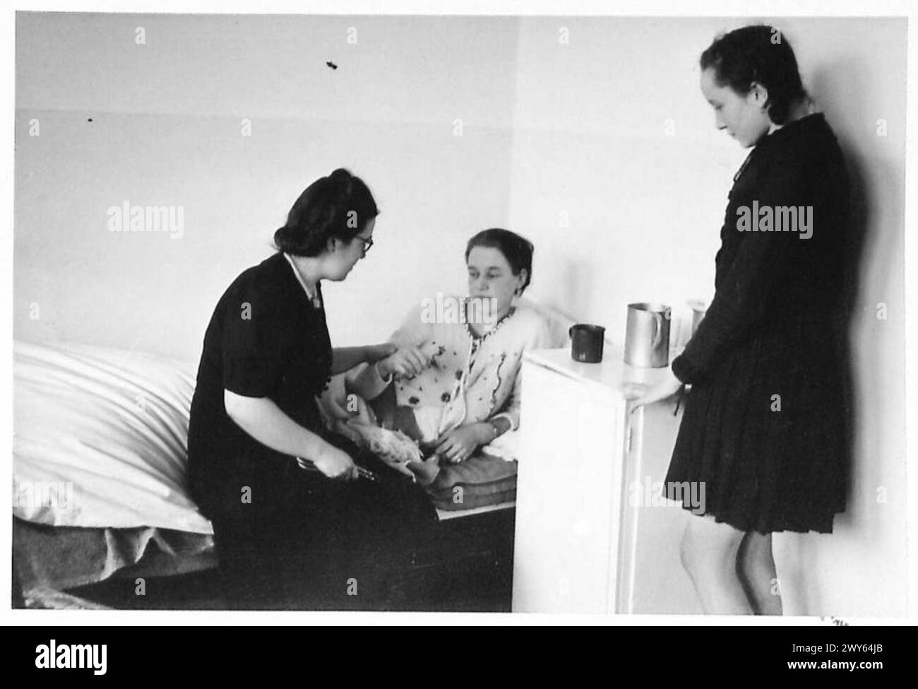 Sick mother daughter woman Black and White Stock Photos & Images - Alamy