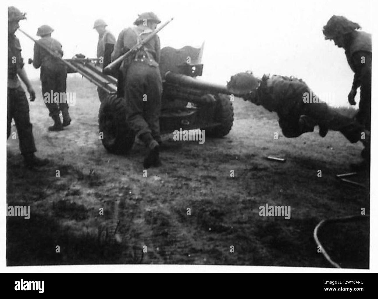 ERECTION OF A CLASS 5 RAFT. - An Anti-Tank gun being manhandled to the ...