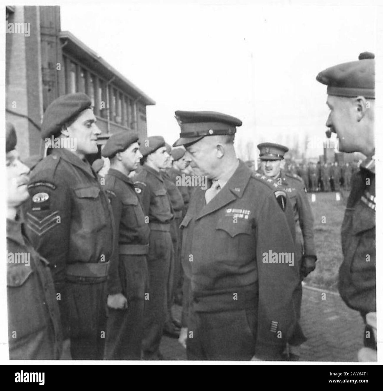 General Eisenhower inspects personnel at the 12 Corps headquarters of ...