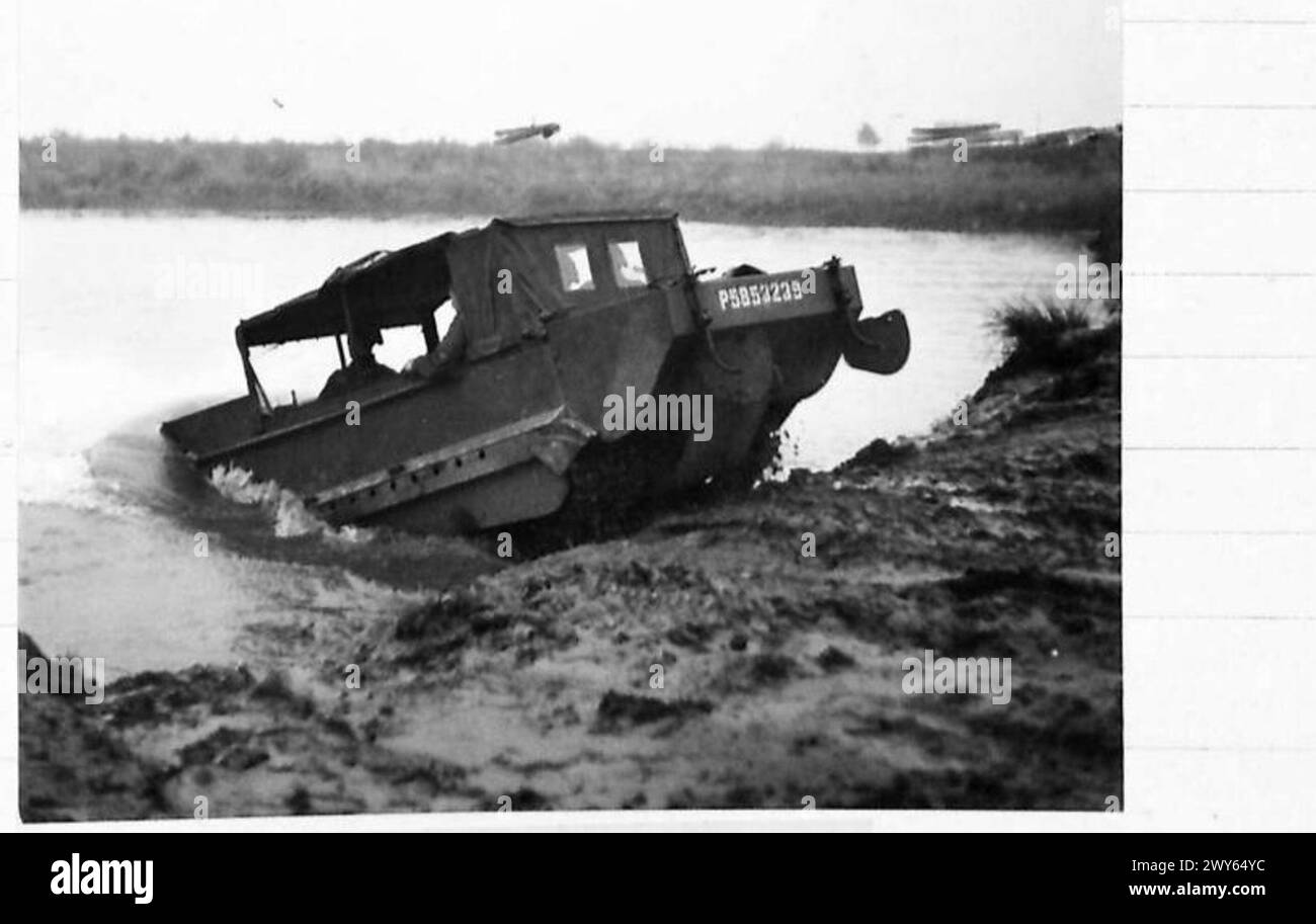 DEMONSTRATION OF AMPHIBIOUS VEHICLES - Weasel 29 climbs a steep bank ...