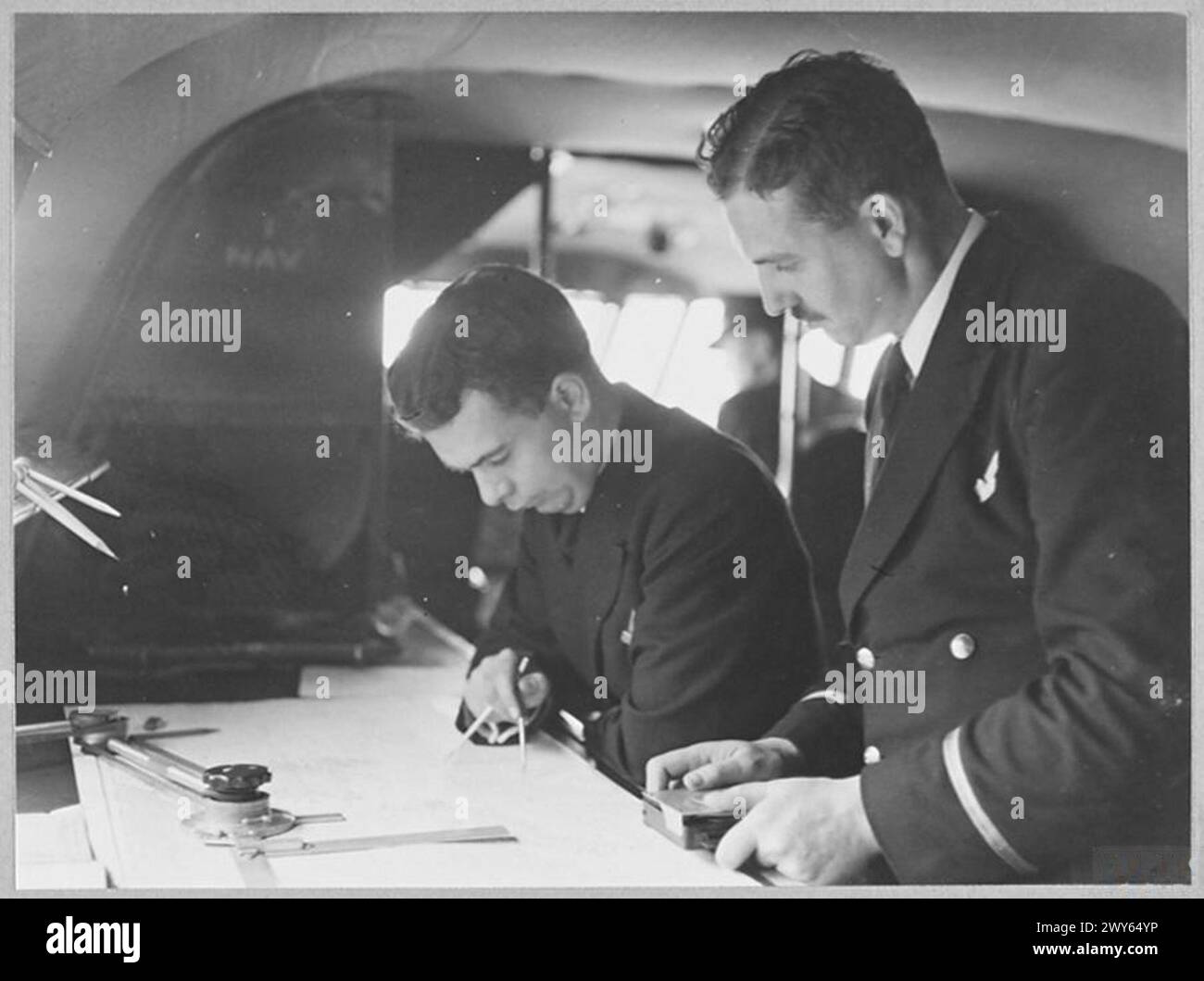 Navigators plot the course on a transatlantic flight in the British ...