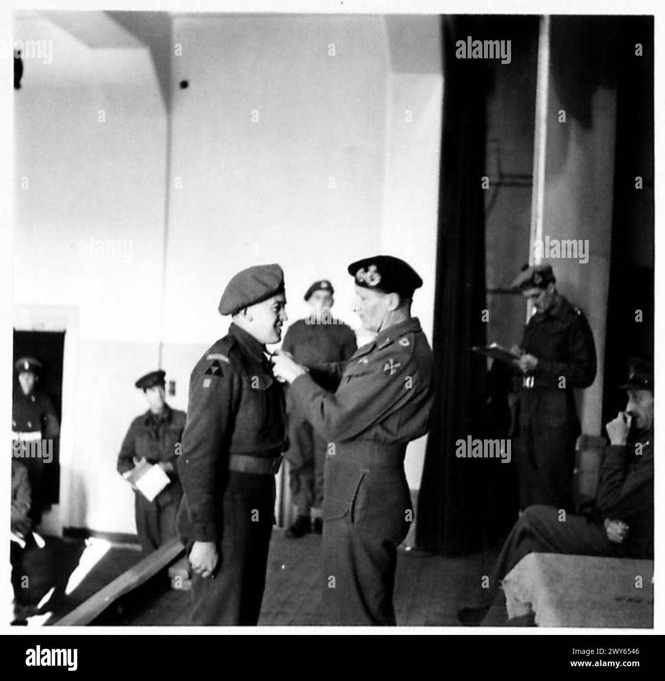 Private S. Clarke of 1st Suffolks receives the Military Medal during an ...