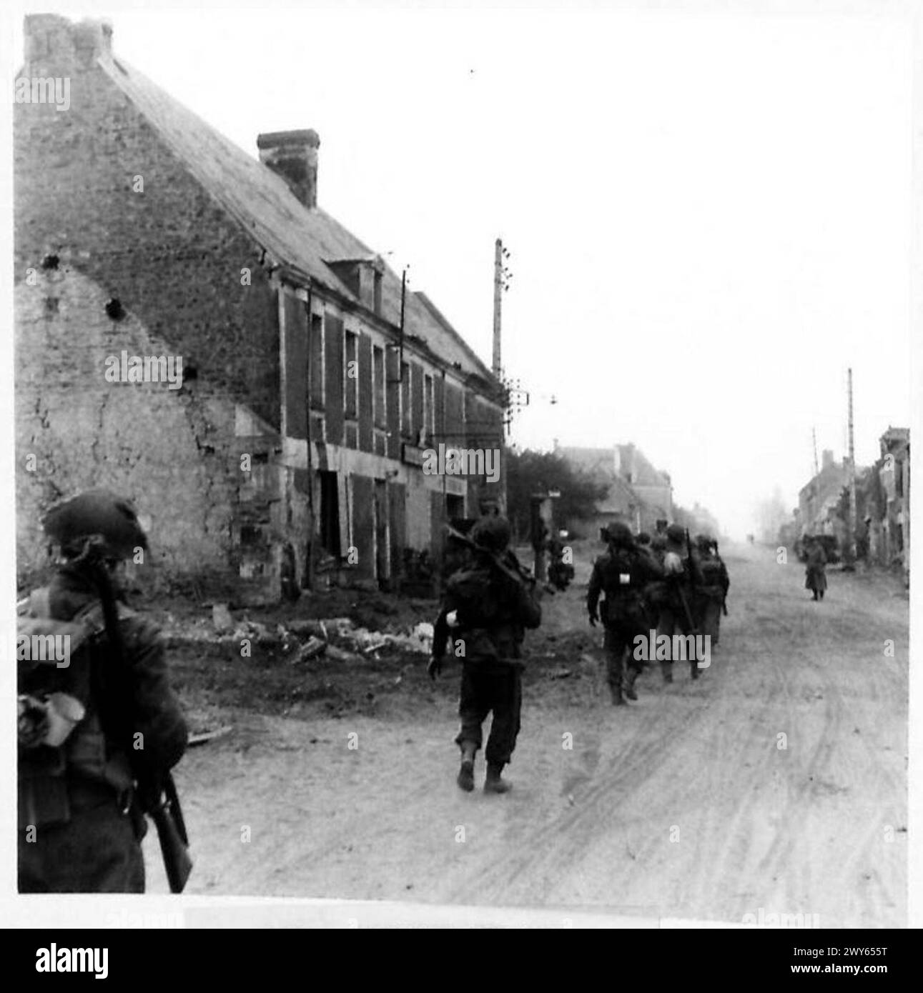THE ATTACK IN THE S/W AREA OF CAEN FOR EVRECY - Infantry moving through ...