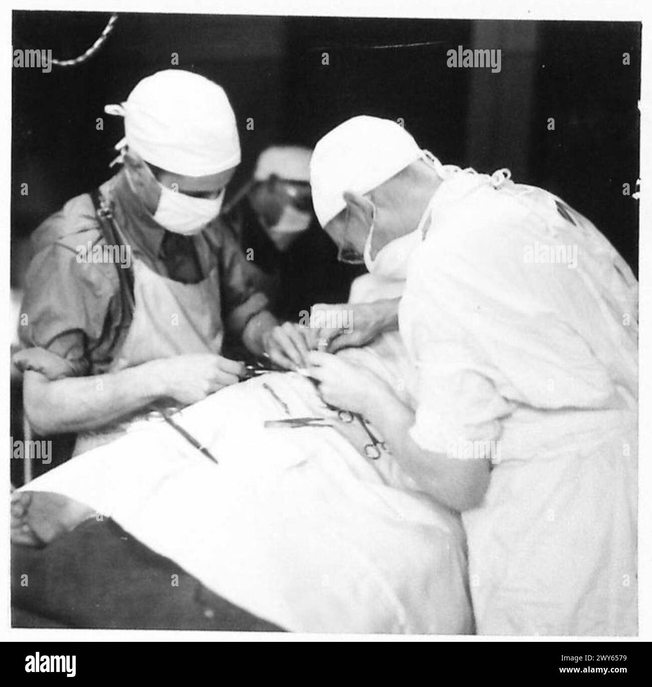 THE PRICE OF VICTORY - During an operation, showing the patient's leg ...