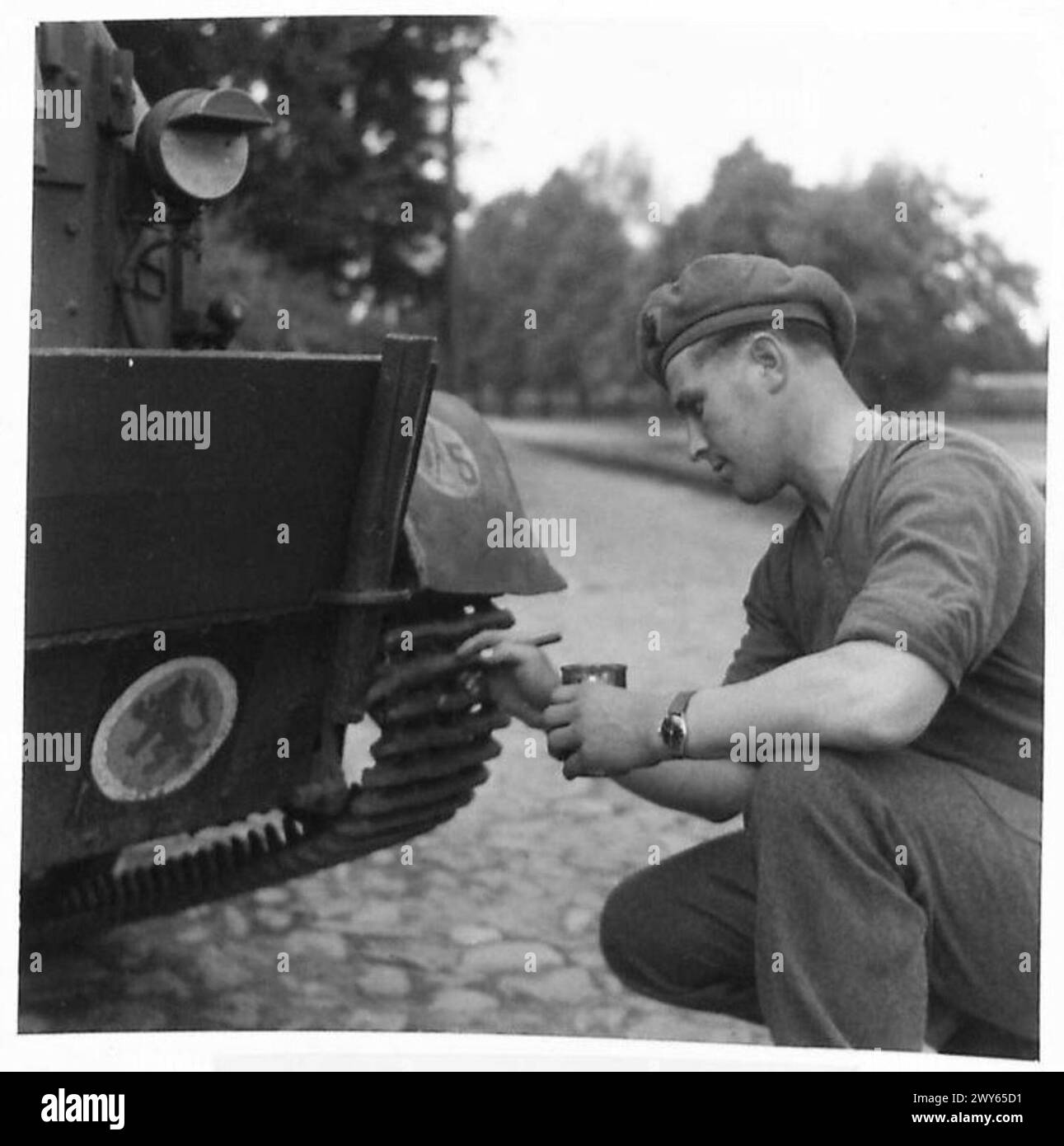 MISCELLANEOUS - Cpl. Leslie Compton puts a new coat of paint on the ...