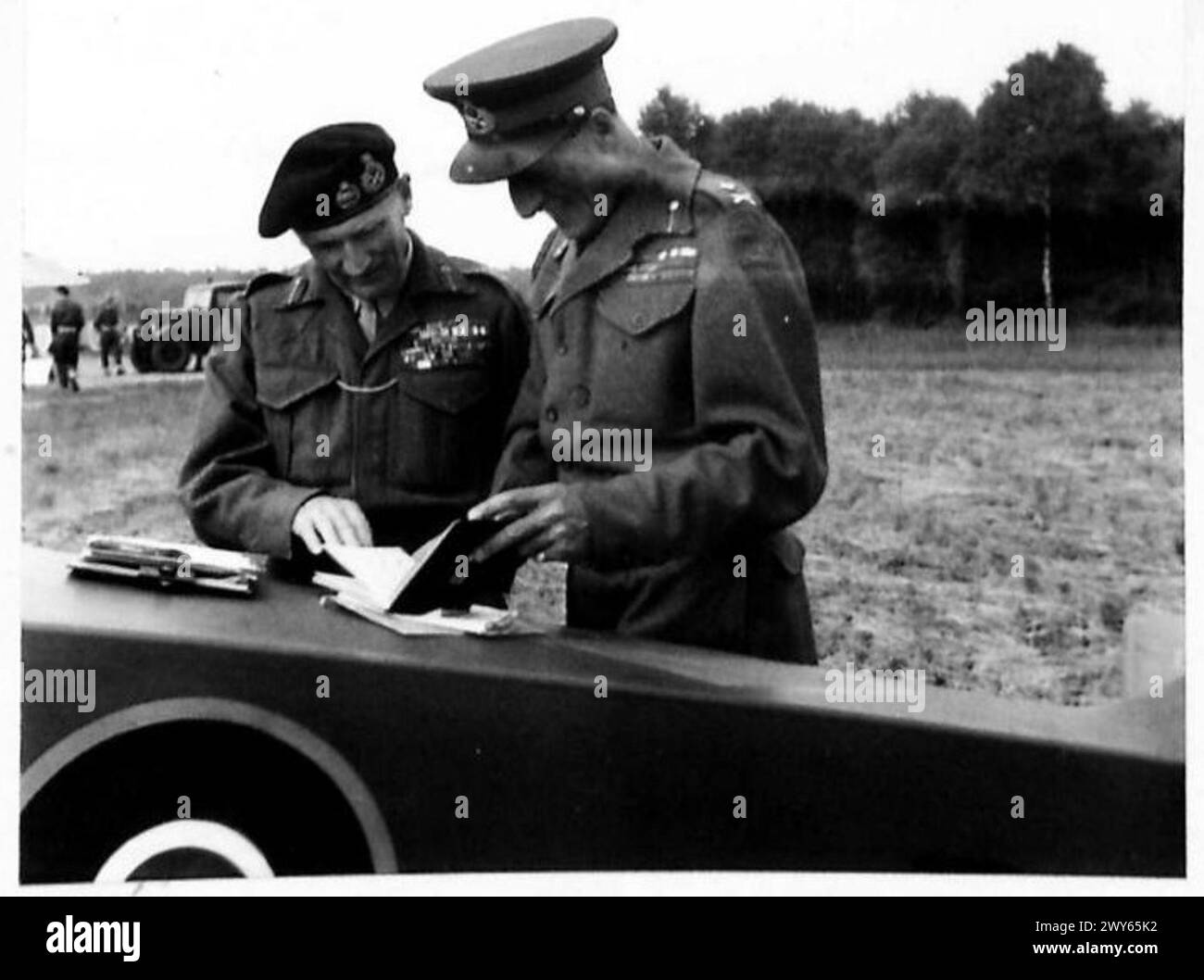 INVESTITURE BY THE C-IN-C AT THE 53RD WELSH DIVISION - The C-in-C being ...