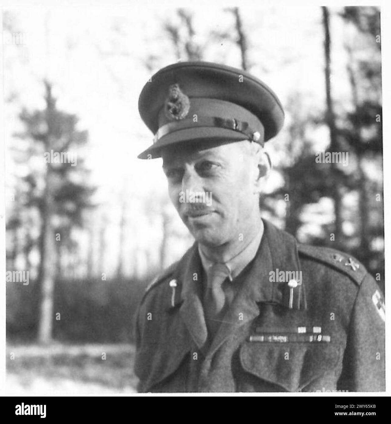 Lieutenant-General Sir Myles Christopher Dempsey, KCB DSO MC, pauses ...