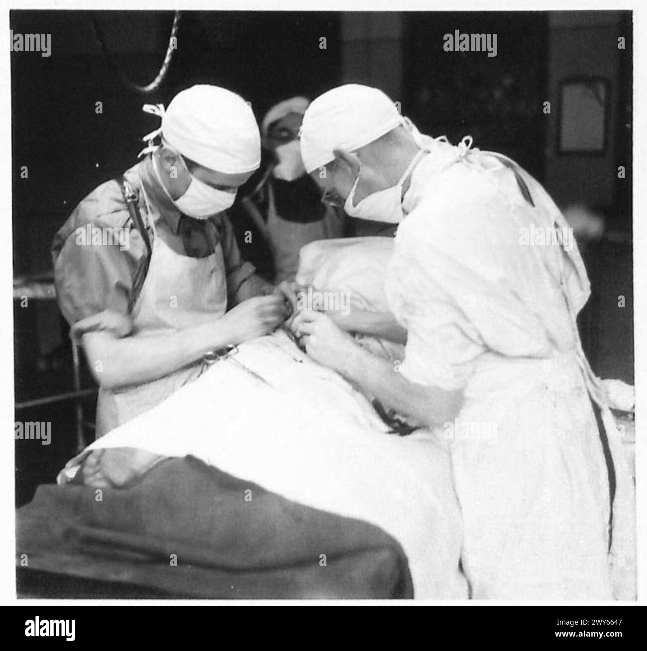 THE PRICE OF VICTORY - During an operation, showing the patient's leg ...
