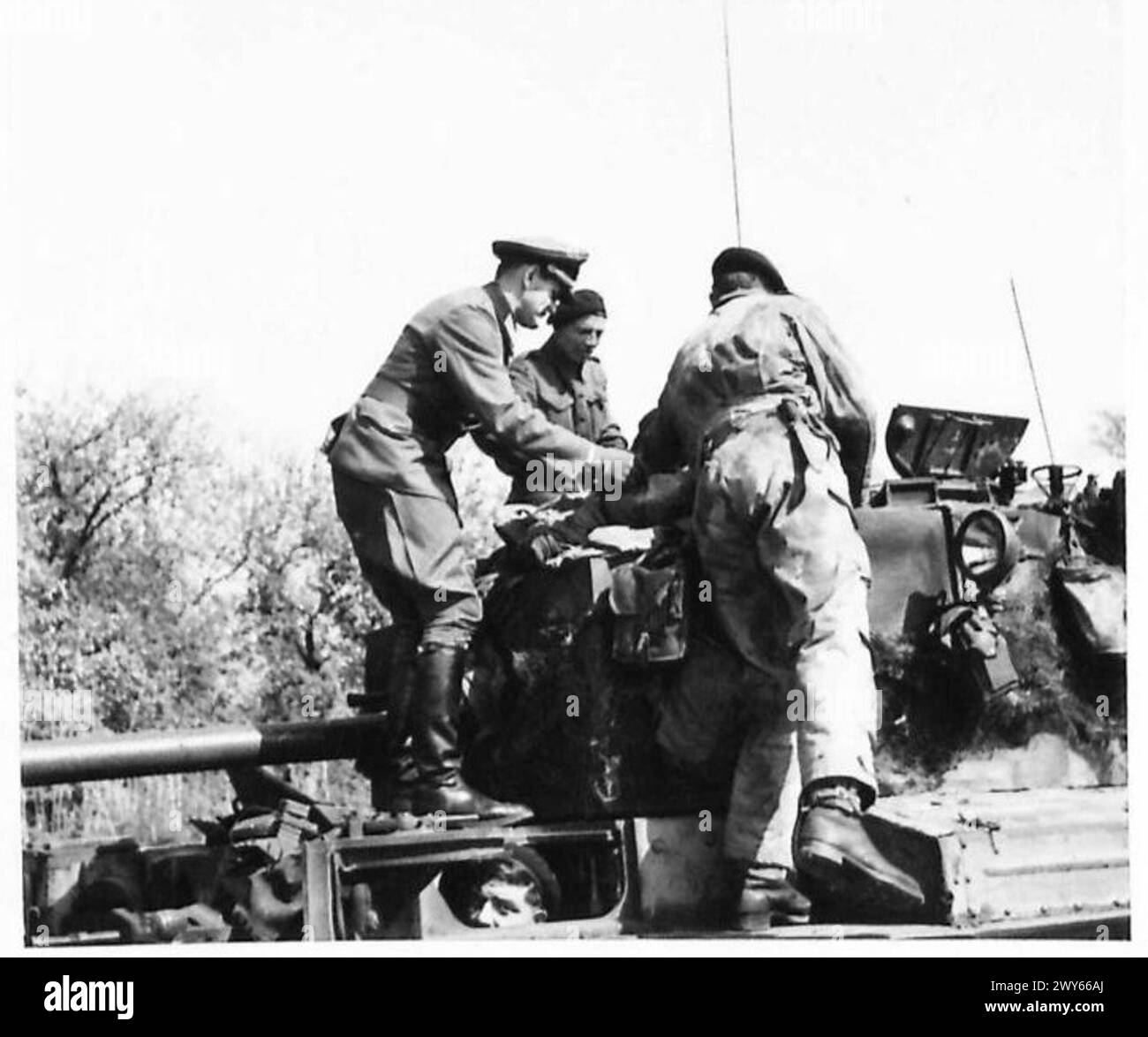 SURRENDER OF CUXHAVEN - The German Commandant on a British tank ...