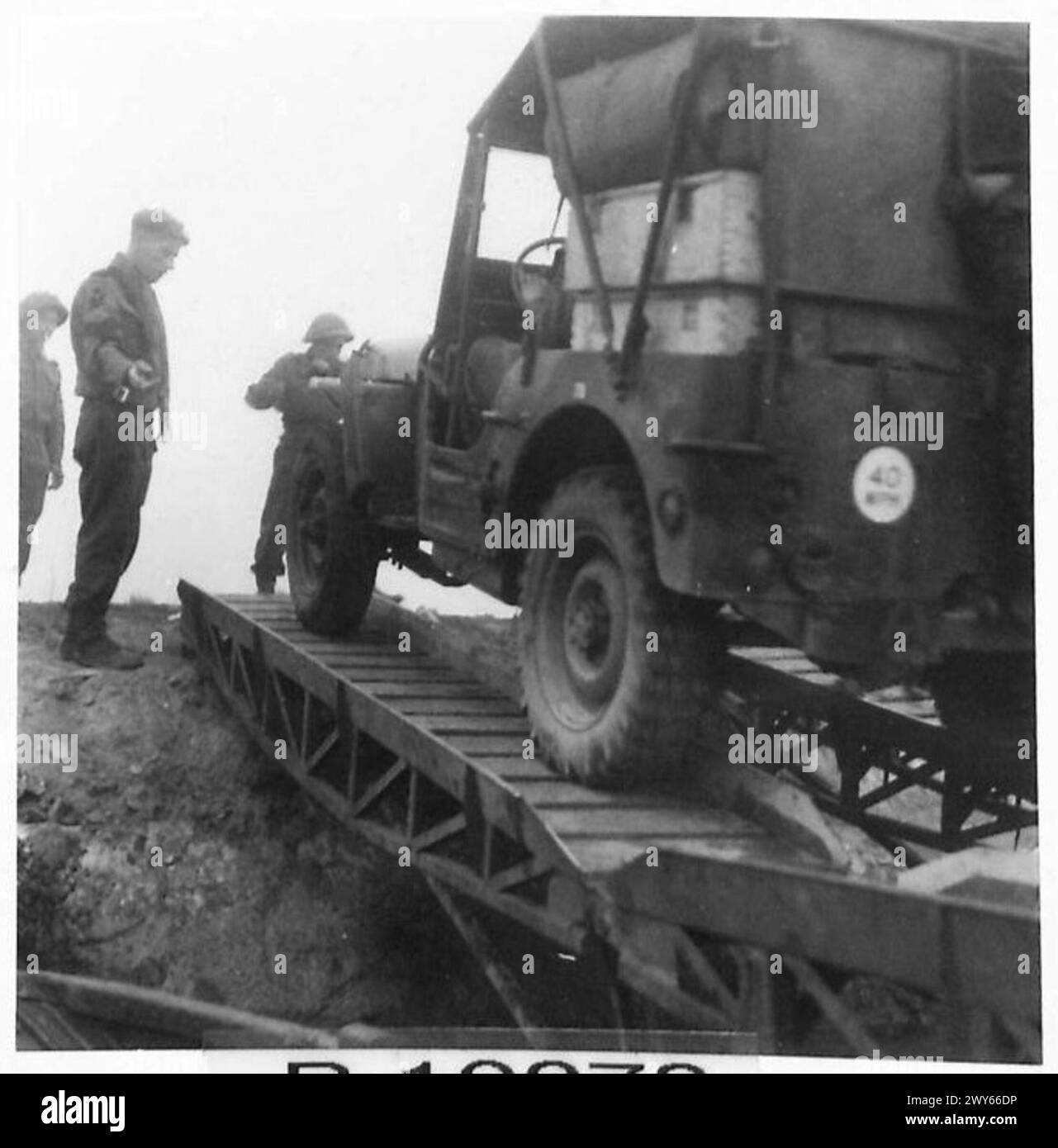 ERECTION OF A CLASS 5 RAFT. - The first vehicle going ashore from the ...