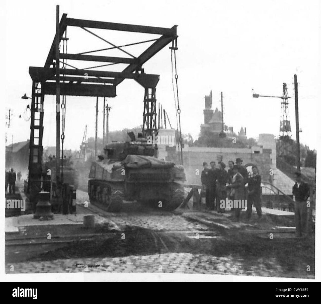 BRITISH ADVANCE TO BRUSSELS - Armour crossing the canal bridge at ...