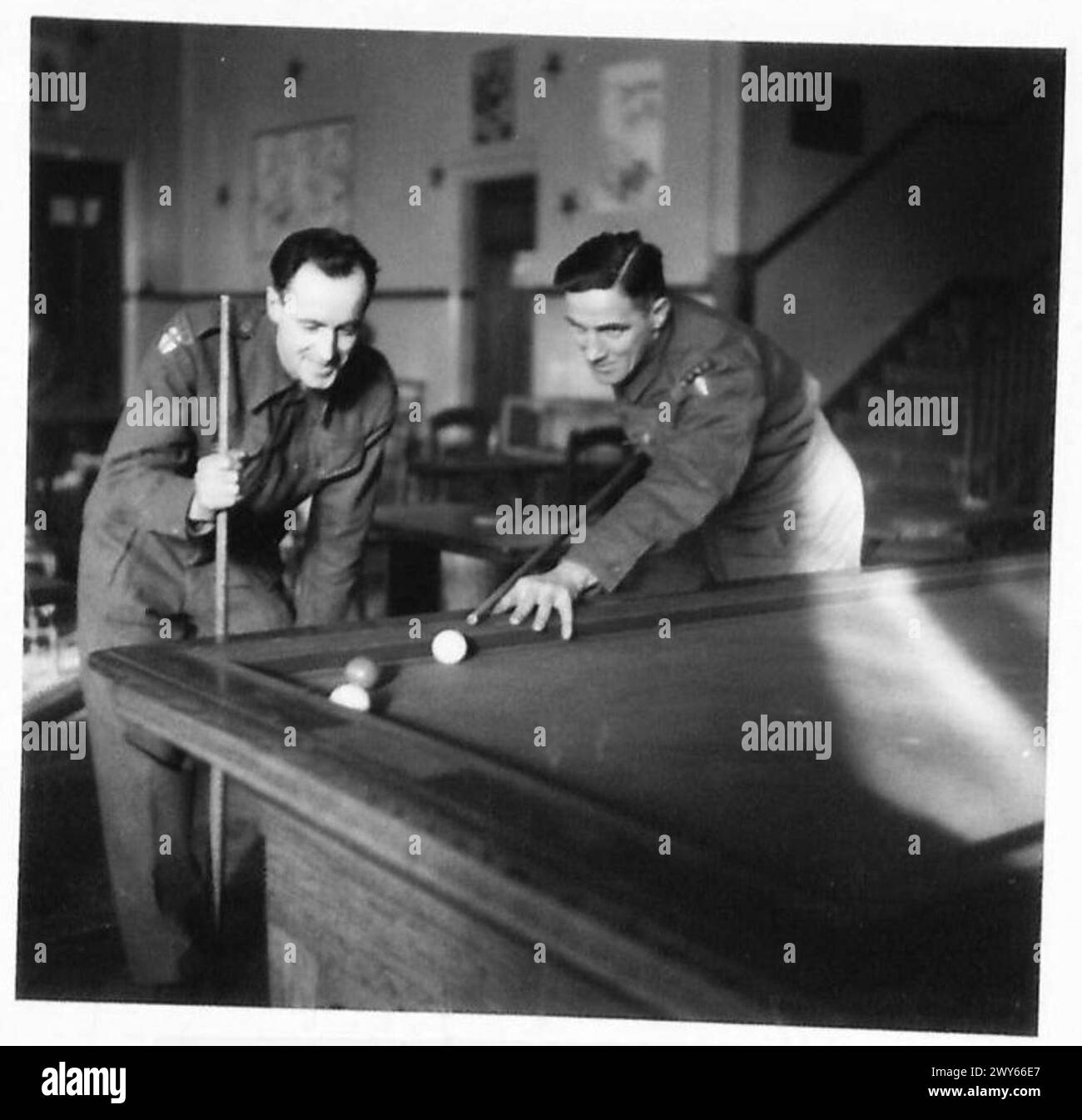 Pte. McCarrol and Dvr. D. Small spend Christmas Day 1944 playing ...