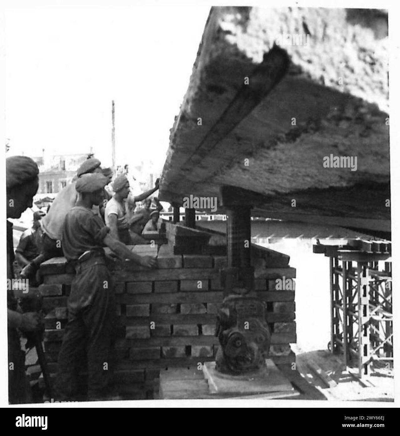 BRIDGE REBUILDING IN CAEN - The three 100 ton capacity jacks holding up ...