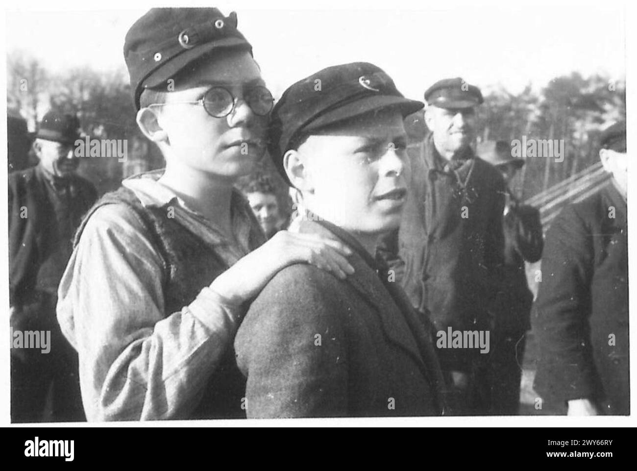 British Army military government officials conduct character studies of ...