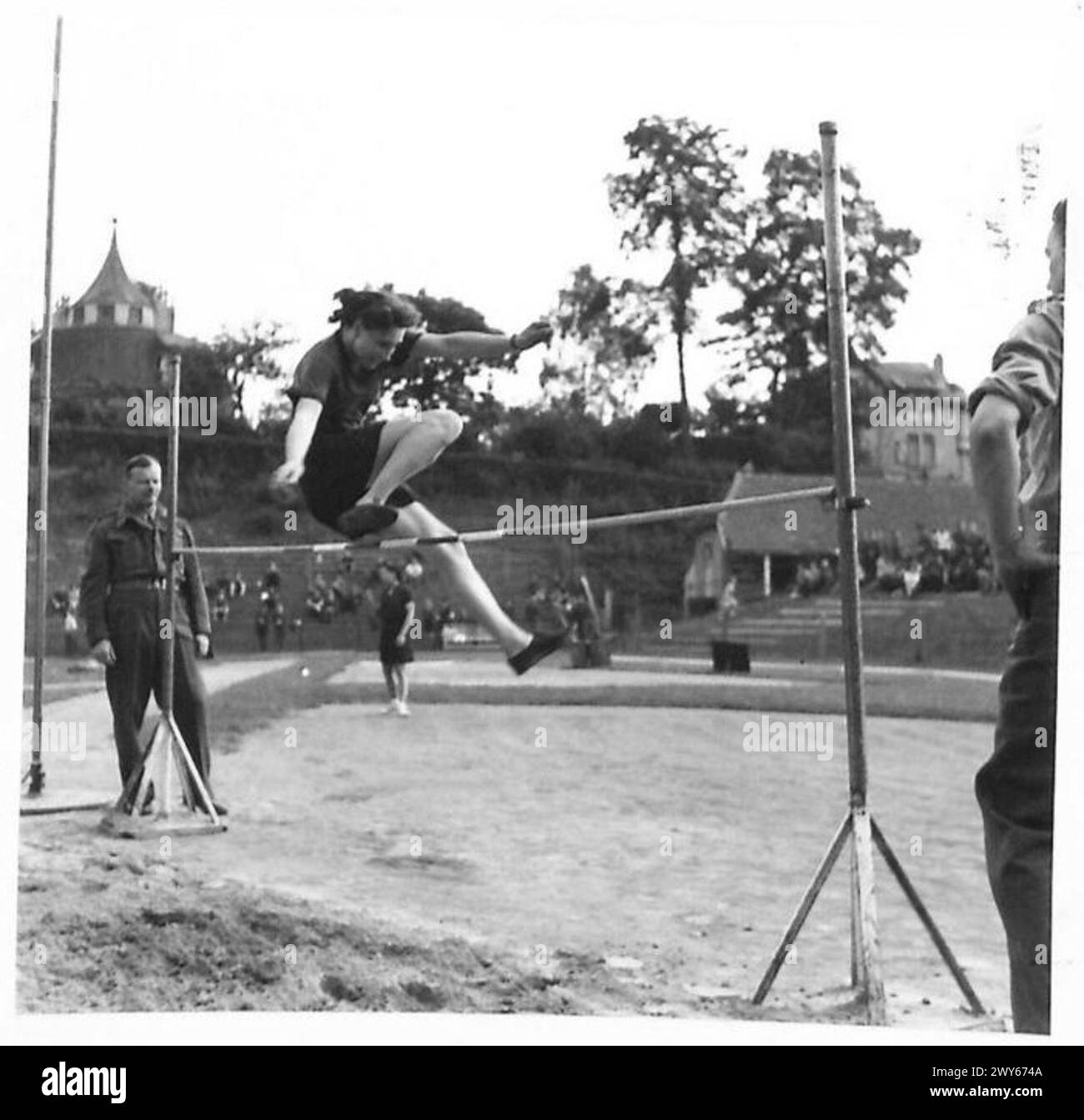 H.Q. L. of C. ATHLETIC MEETING - A.T.S. Pte. Johnson jumping 710" in ...