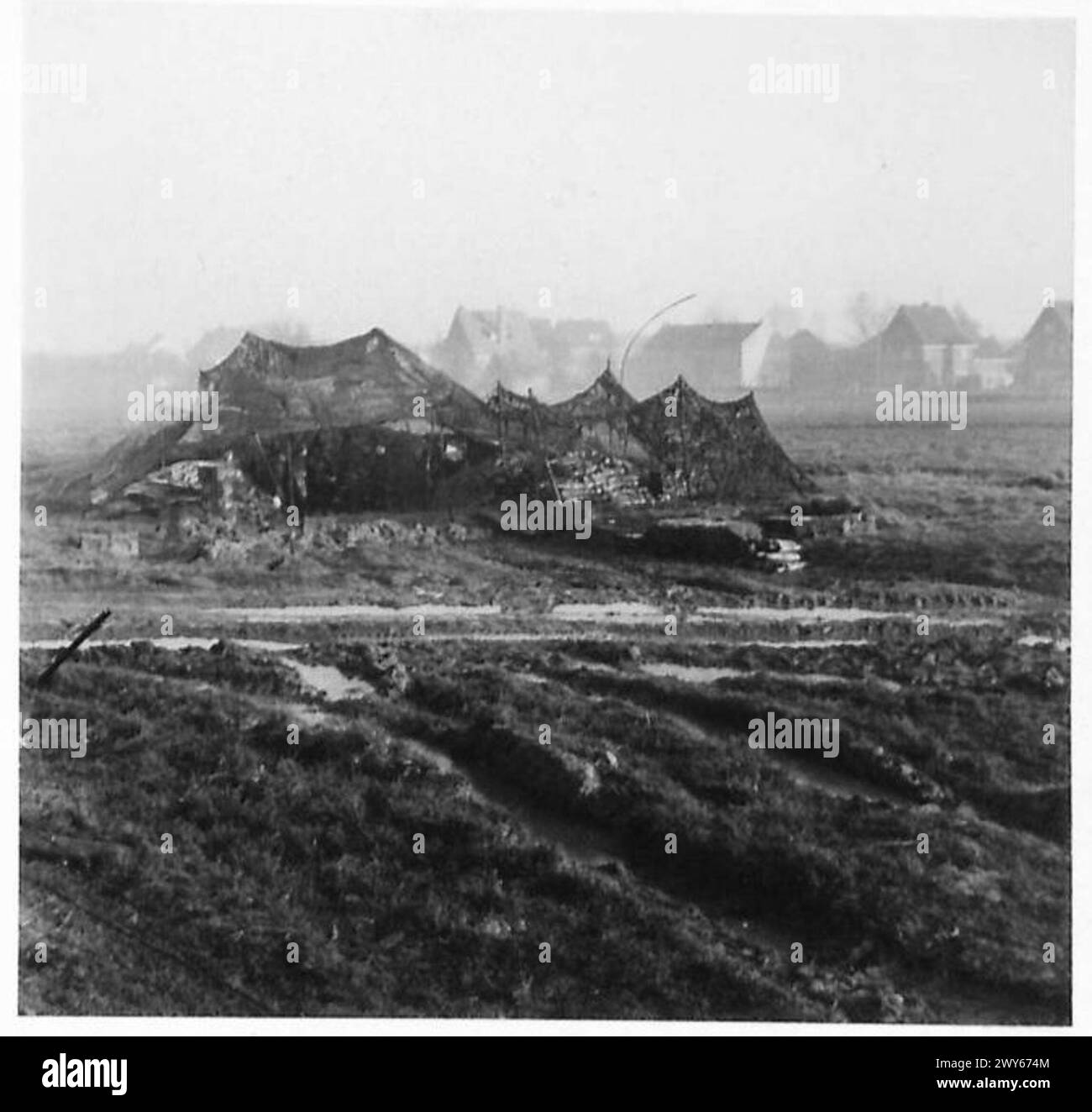 DIVISIONAL ARTILLERY IN ACTION - Puzzle, Find the Gun -- Well, aircraft ...