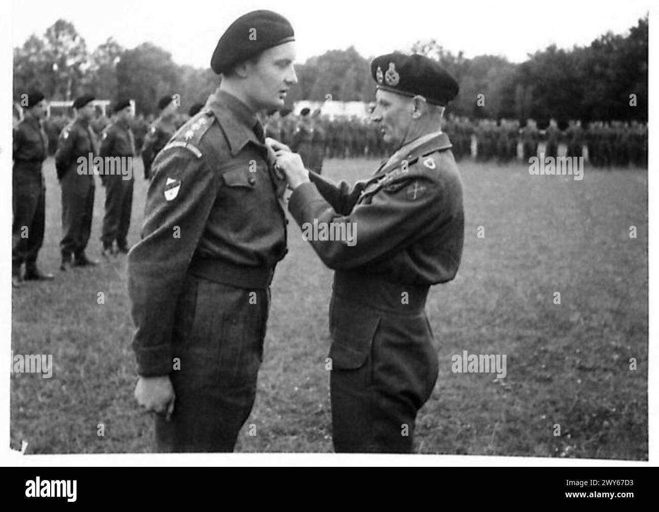 INVESTITURE CEREMONY FOR MEN OF THE 6TH GUARDS ARMOURED BRIGADE ...