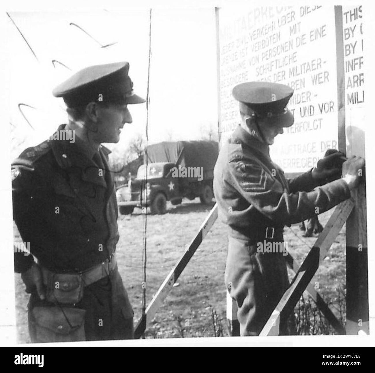 British officers Col. E.H. George and Major E.H.U. Keighley oversee ...