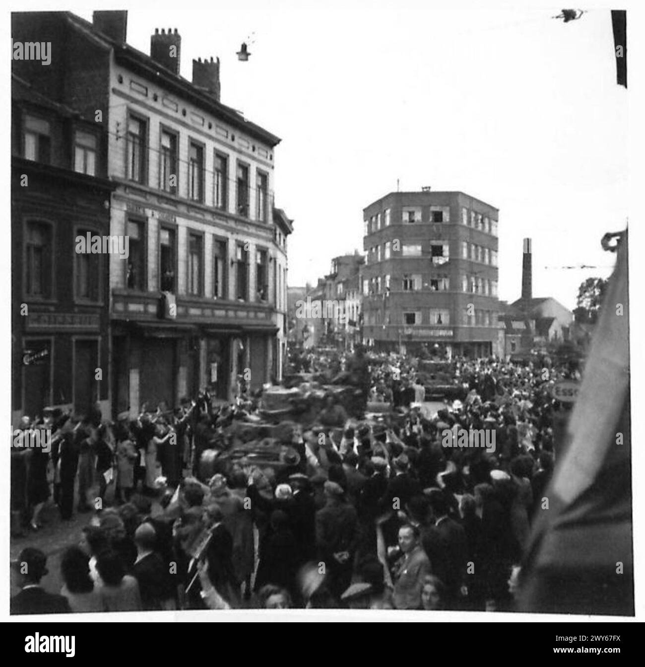 CROSSING INTO BELGIUM TO RONGY - Allied armour passes through the lined ...