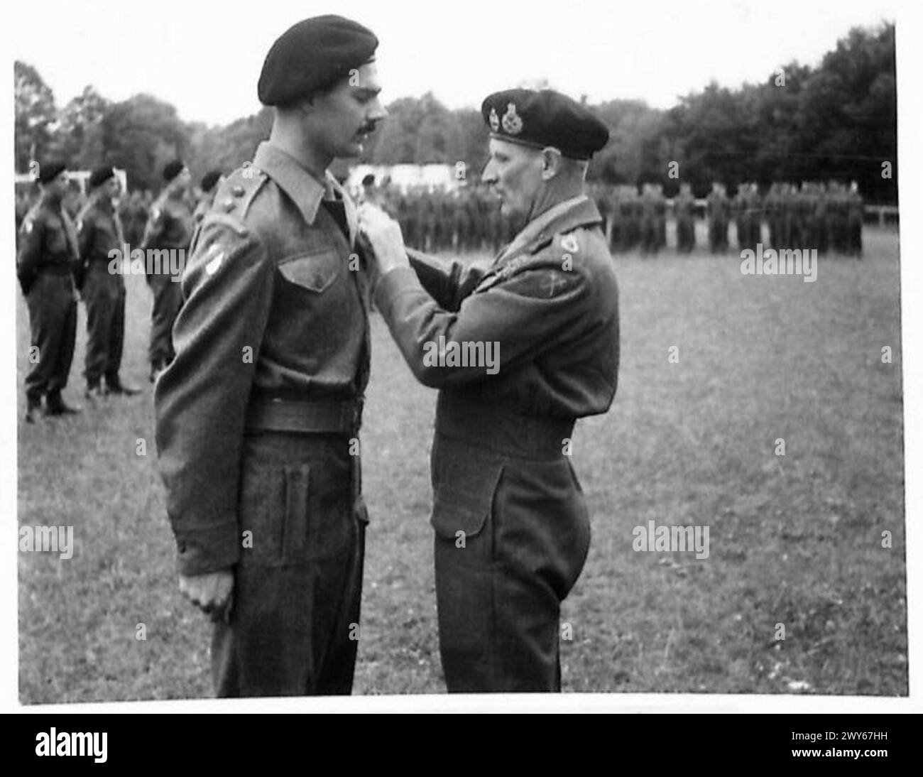 INVESTITURE CEREMONY FOR MEN OF THE 6TH GUARDS ARMOURED BRIGADE ...