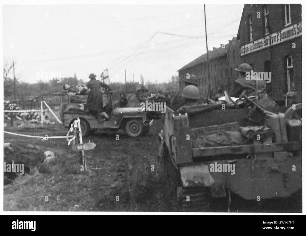 A British motorized unit enters German territory for their first battle ...
