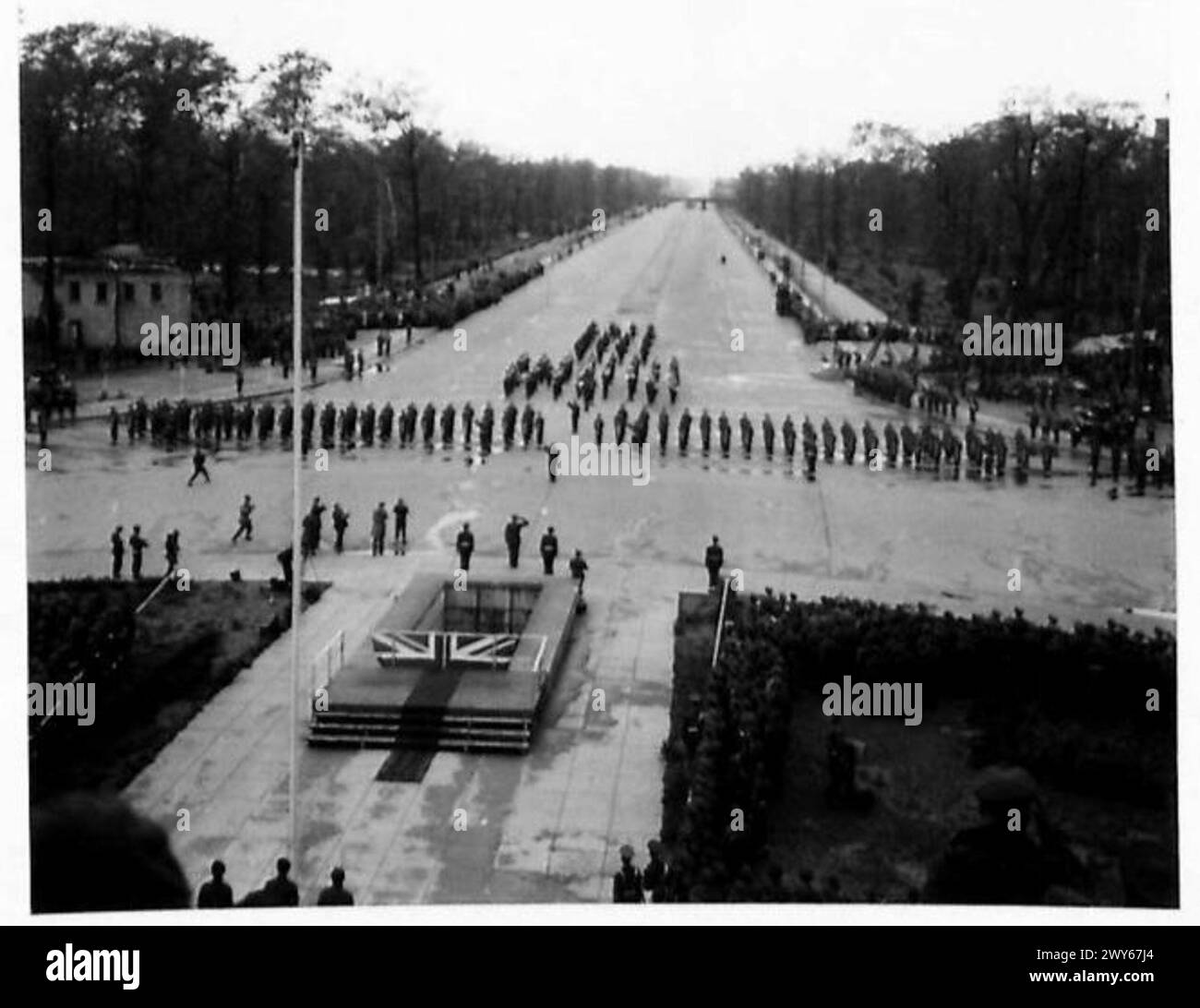 Lieutenant General Sir Ronald Weeks takes the salute during the flag ...