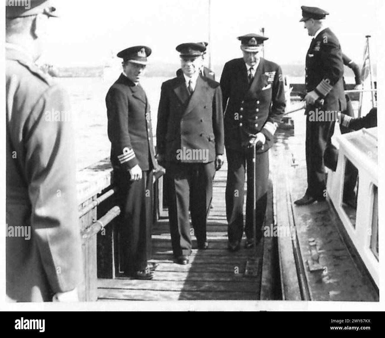 The First Lord of the Admiralty arrives at Kiel Yacht Club, greeted by ...