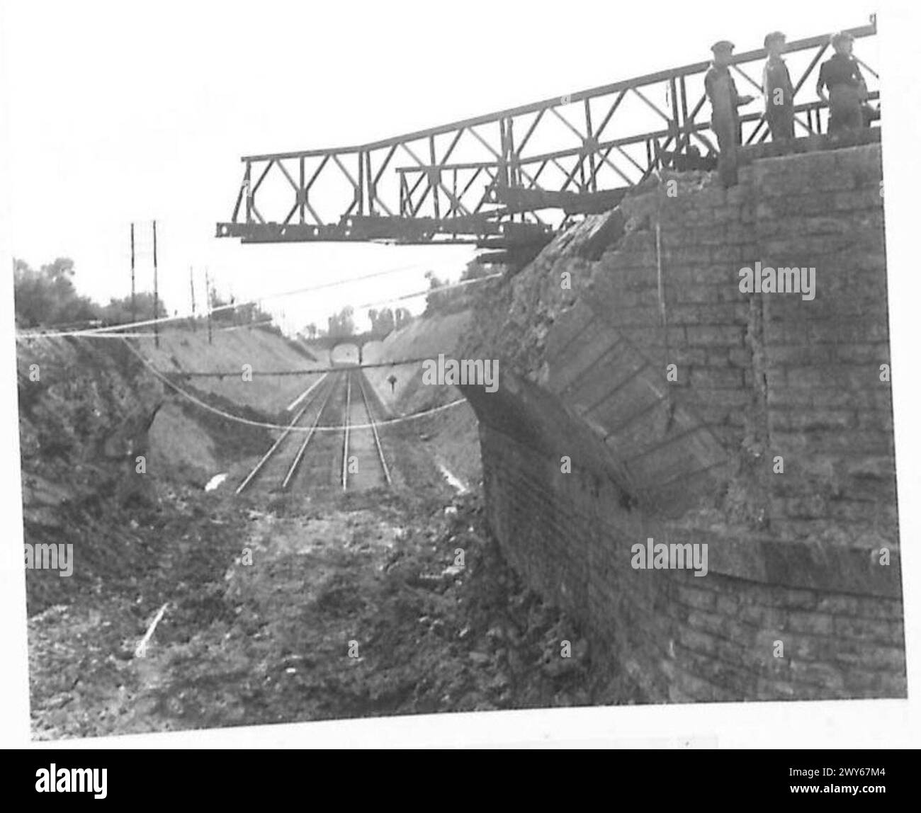 THE BAILEY BRIDGE IN FRANCE - The bridge is pushed halfway over the gap ...