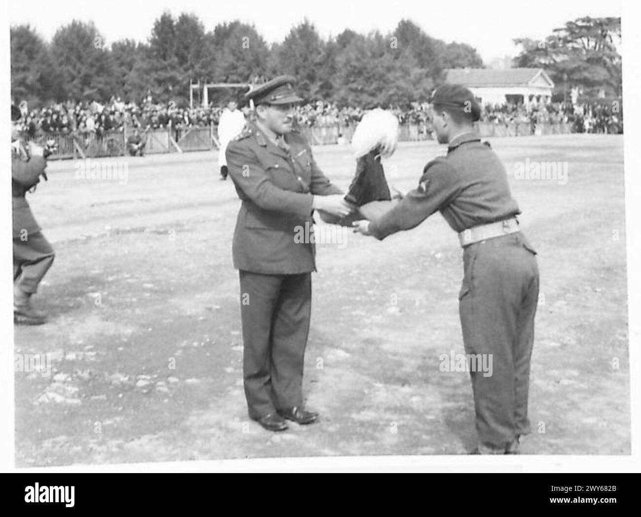 BRIG J.M. CALVERT, DSO, HANDS OVER HIS COMMAND OF THE 3RD AND 4TH BATT ...