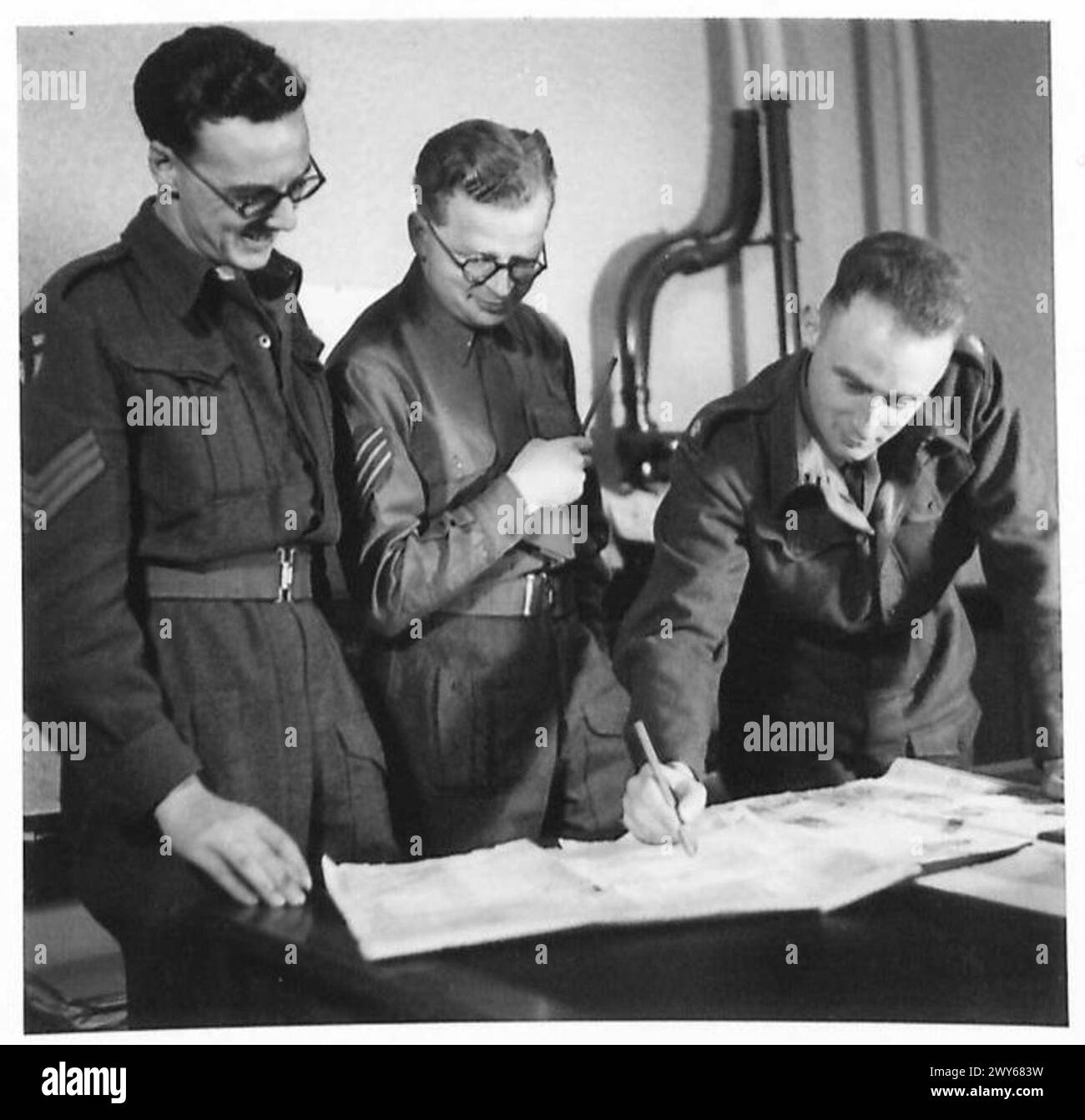 Sergeant Davies and Sgt. Friell discussed the setup of a story with ...