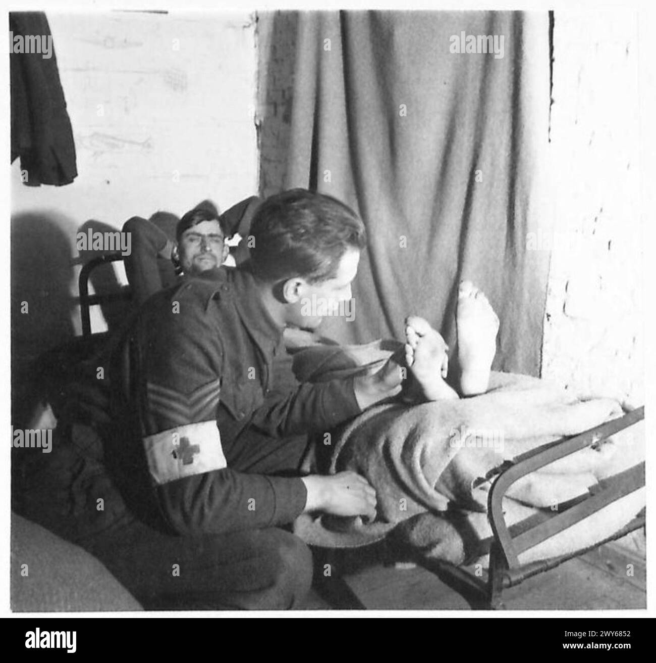 PS. C W - Bad case of trench feet in the M.I. room sick bay at the camp ...