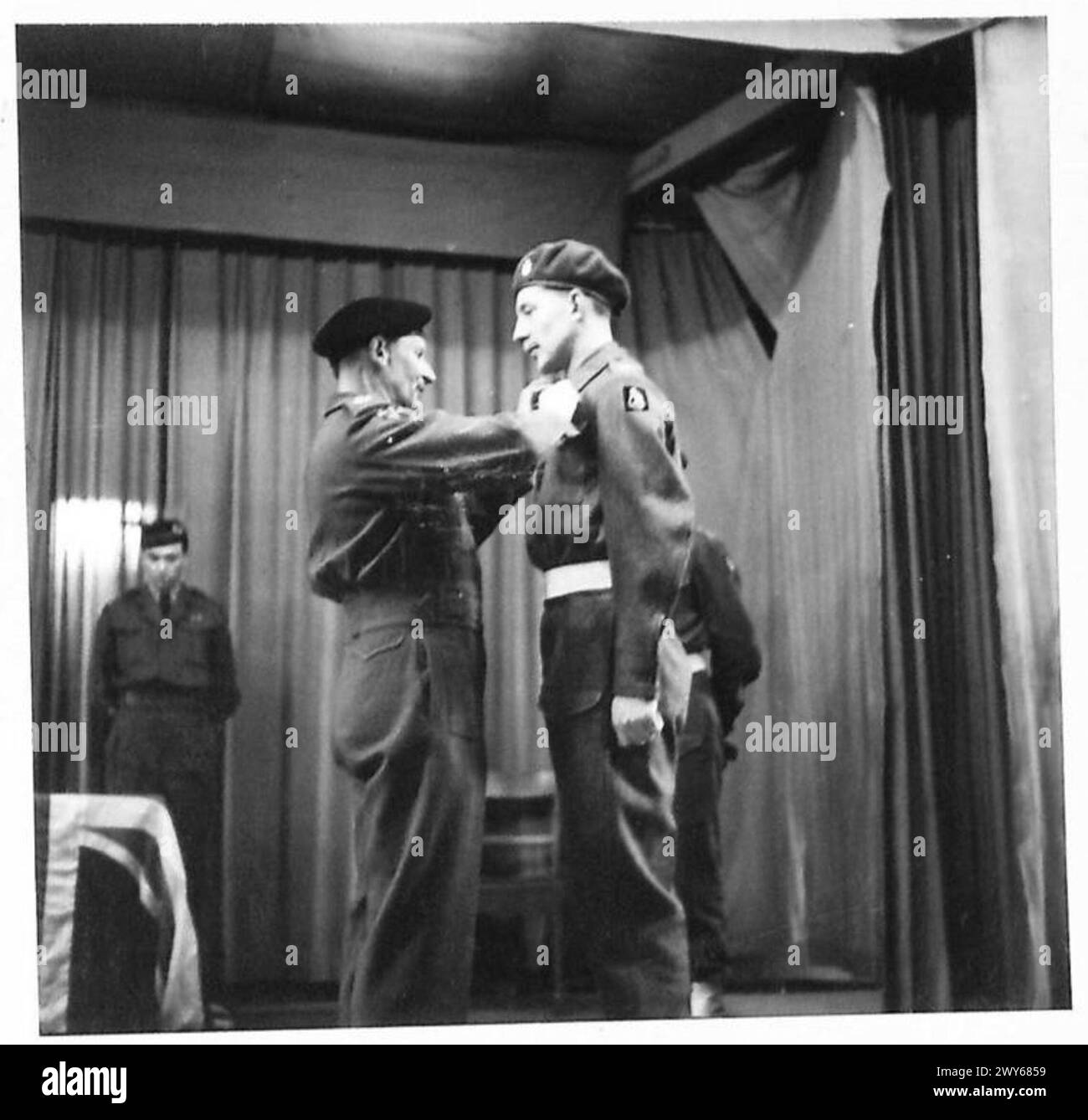 INVESTITURE BY FIELD MARSHAL MONTGOMERY - Major Bayley 3 RHA receives ...