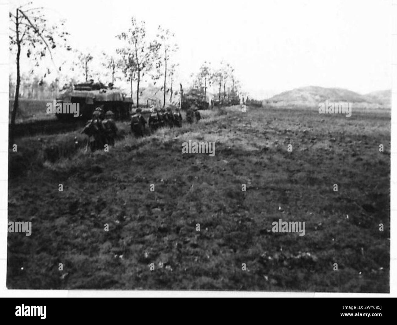 SAME STORY. - Infantry and Kangaroos moving up towards Schijndel ...