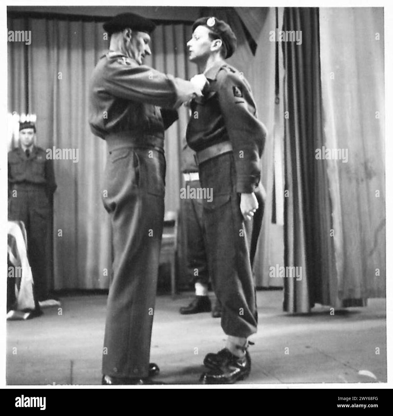 INVESTITURE BY FIELD MARSHAL MONTGOMERY - Lt Apsey 1 RB receives the MC ...
